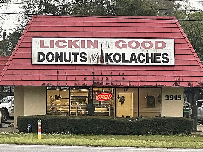 That iconic red roof announces your arrival at donut paradise. Like a lighthouse for the sugar-deprived, it guides hungry travelers to sweet salvation.