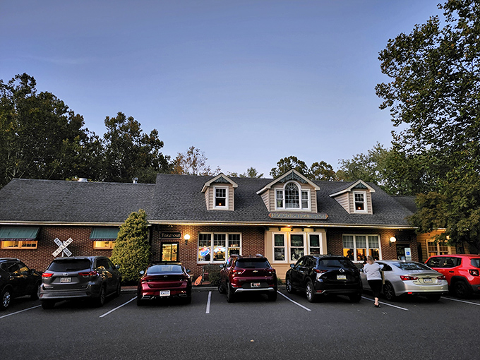 The charming exterior of Moccia's Train Stop looks more like a cozy country home than a restaurant. Those dormers and warm lighting promise comfort food magic within.