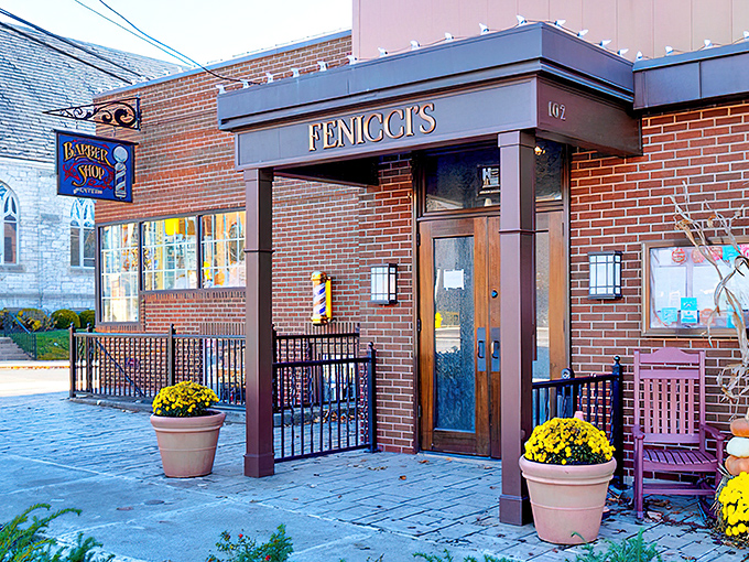 The brick facade of Fenicci's welcomes you like an old friend, with cheerful yellow mums standing guard at the entrance.