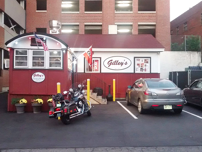 Nestled between modern buildings, this vintage lunch cart looks like it time-traveled from an era when food was honest and portions were generous.