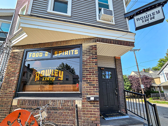 The unassuming brick exterior of Rowley Inn has welcomed hungry Clevelanders since 1906, standing like a time capsule in Tremont's evolving landscape.