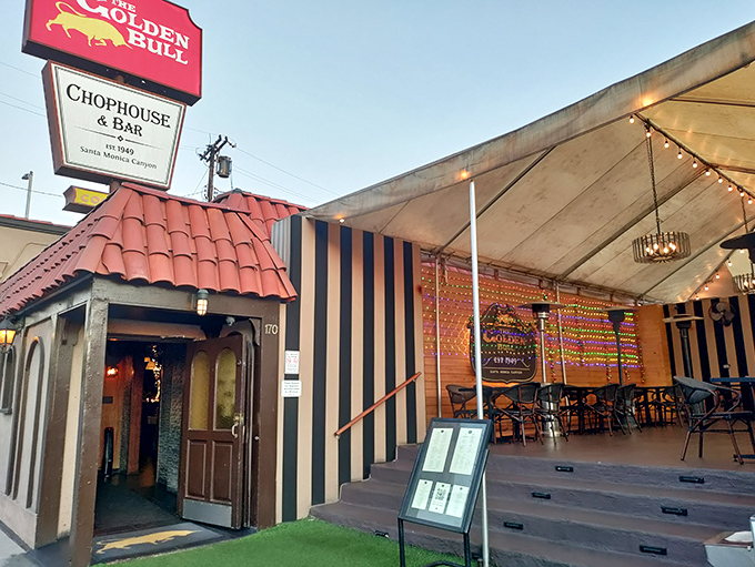 The iconic red-tiled roof and vintage signage of Golden Bull stand as a beacon for steak lovers in Santa Monica Canyon, promising timeless dining rather than fleeting trends.