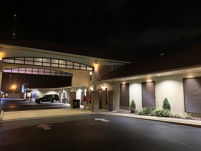 The elegant entrance to Christner's beckons like a beacon in the night, promising refuge from Orlando's tourist chaos and entry to a world of culinary sophistication.