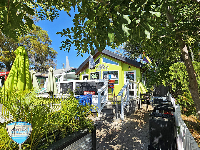 The lime-green cottage with its cheerful umbrellas doesn&rsquo;t just catch your eye&mdash;it radiates morning joy, inviting everyone in for a dose of sunshine and comfort on a plate.