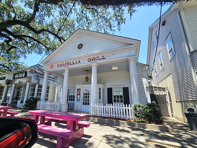 The stately white columns of The Camellia Grill welcome you like an old friend who happens to live in a Greek Revival mansion that serves incredible waffles.