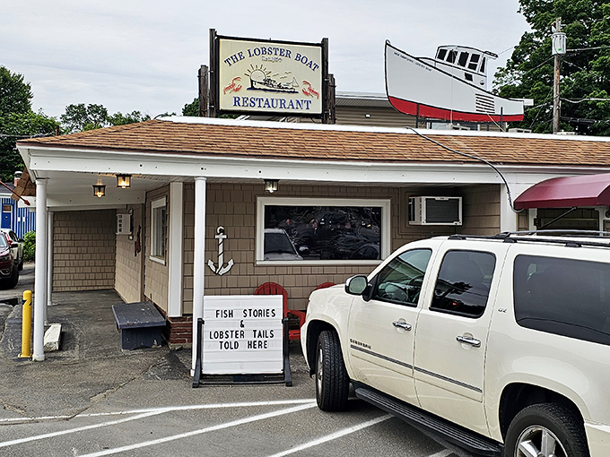 The ultimate seafood treasure hunt ends here &ndash; a charming shingle-sided building with a replica lobster boat perched proudly on the roof like a maritime crown.