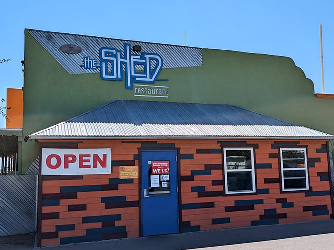 The unassuming exterior of The Shed might fool you, but that bright blue door is actually a portal to flavor paradise.
