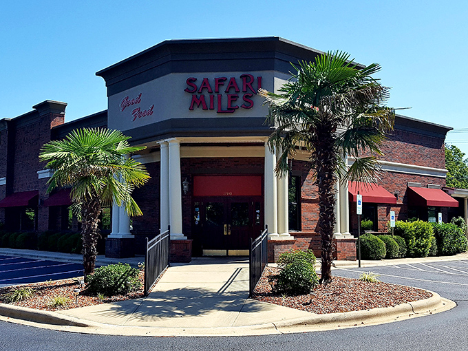 The palm trees flanking Safari Miles' entrance aren't just decorative&mdash;they're a promise that you're about to embark on a culinary adventure worth writing home about.