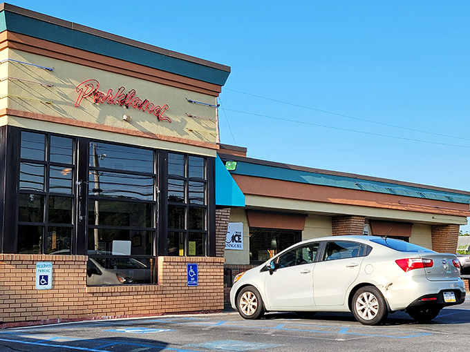 The welcoming neon sign of Parkland Restaurant glows against the Allentown sky, beckoning hungry travelers like a lighthouse for comfort food enthusiasts.