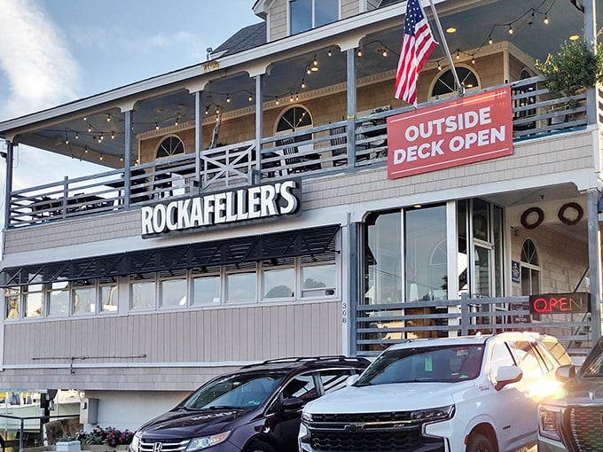 The coastal charm of Rockafeller's exterior beckons with its wraparound deck and American flag fluttering above&mdash;a siren call to seafood lovers everywhere.
