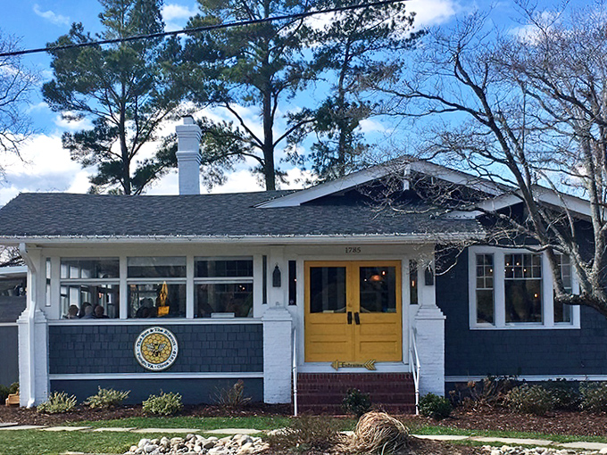 The navy blue cottage with that sunshine-yellow door isn't just Instagram bait&mdash;it's your portal to breakfast nirvana in Virginia Beach's Pungo neighborhood.