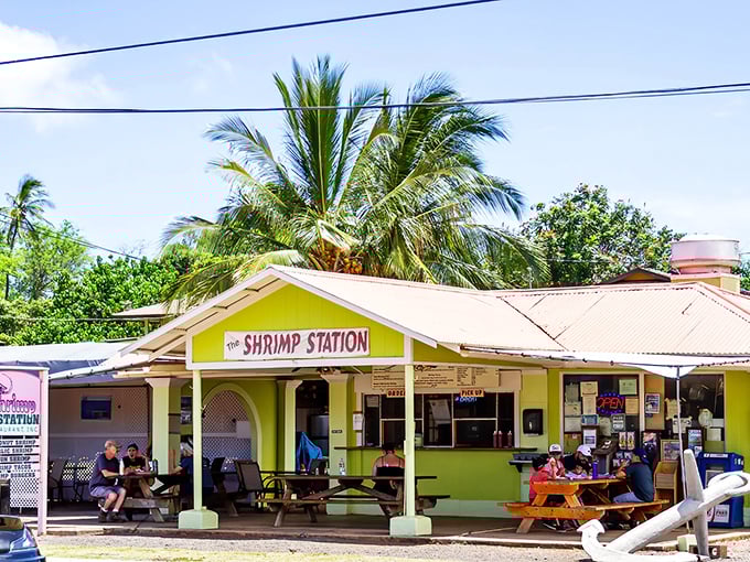 The bright yellow beacon of shrimp perfection stands proudly under swaying palms, promising seafood salvation to all who approach.