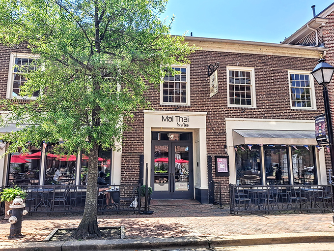 Historic charm meets culinary excellence at Mai Thai's brick fa&ccedil;ade in Old Town Alexandria. Those red awnings practically whisper, "Come in, the noodles are calling."