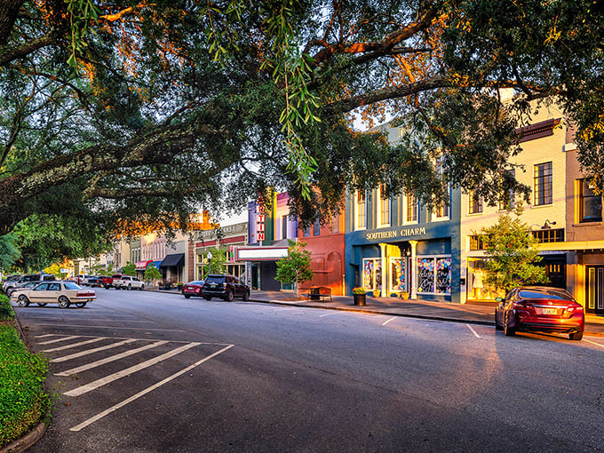 Broad Street's historic storefronts glow with golden hour warmth, where Southern Charm isn't just a store name&mdash;it's the town's unofficial motto.