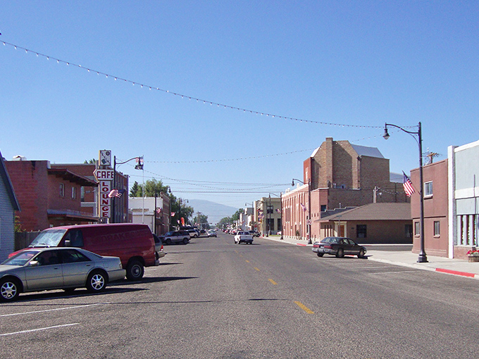 Rupert's main street stretches toward distant mountains, offering that perfect small-town vibe where rush hour means three cars at the stoplight.