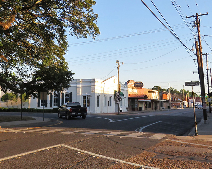 Abbeville's historic downtown streets bask in golden hour light, where time slows and Hallmark-worthy charm comes naturally.