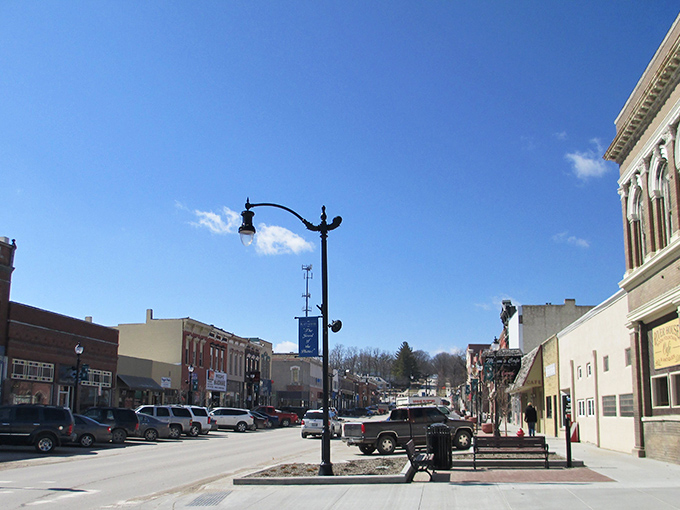 Vintage lampposts and welcoming benches invite visitors to slow down and savor small-town rhythms, a refreshing counterpoint to our perpetually hurried world.