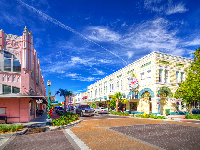 Downtown Arcadia's pastel-colored buildings pop against the brilliant blue Florida sky, creating a postcard-perfect scene that screams "affordable paradise."