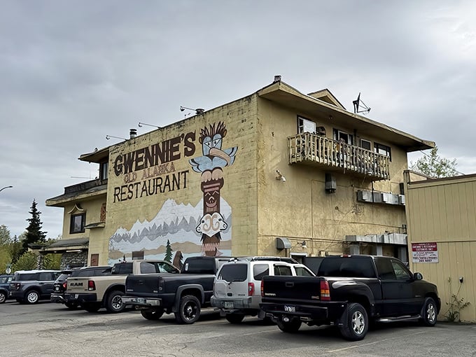 The yellow exterior of Gwennie's stands like a beacon of breakfast hope against Alaska's often-gray skies, complete with a cheerful Eskimo mascot.