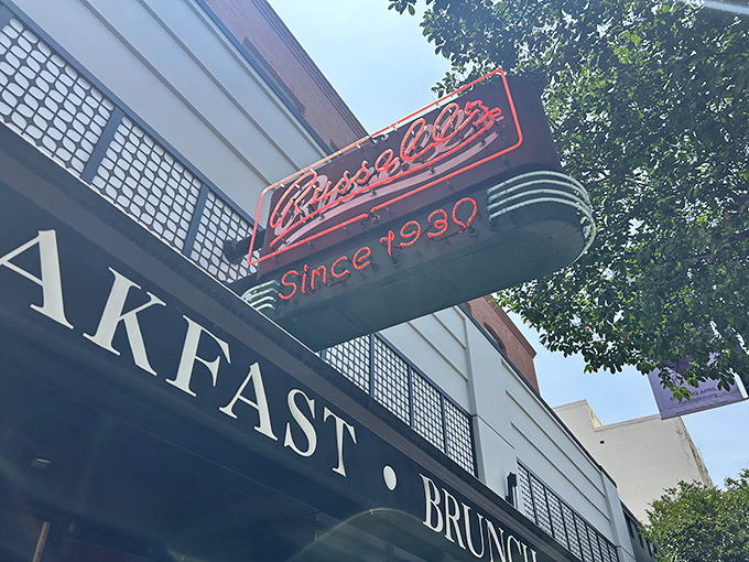 That neon glow isn't just nostalgic&mdash;it's a promise of hash brown glory waiting just beyond those doors.
