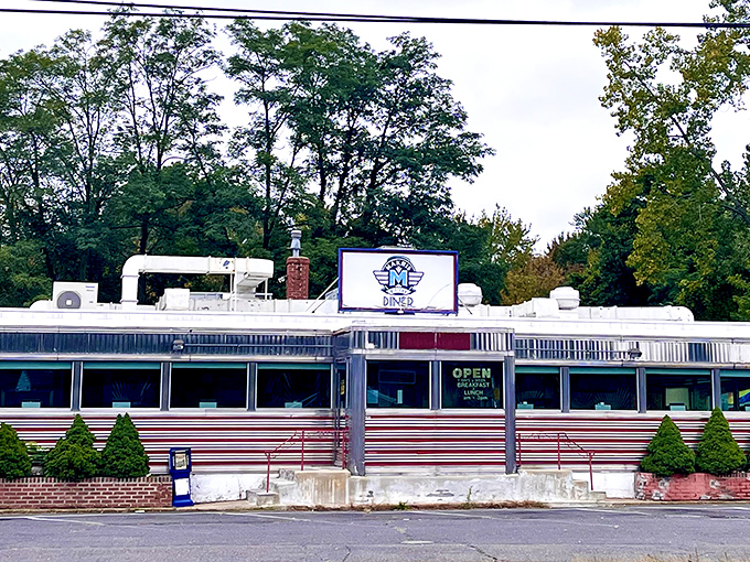 The gleaming stainless steel exterior of Makris Diner stands like a time capsule on the Berlin Turnpike, promising comfort food and conversations that matter.