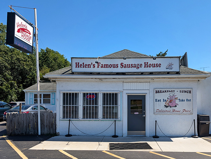 The unassuming white exterior of Helen's Sausage House stands like a breakfast beacon on Route 13, promising delicious rewards for those in the know.