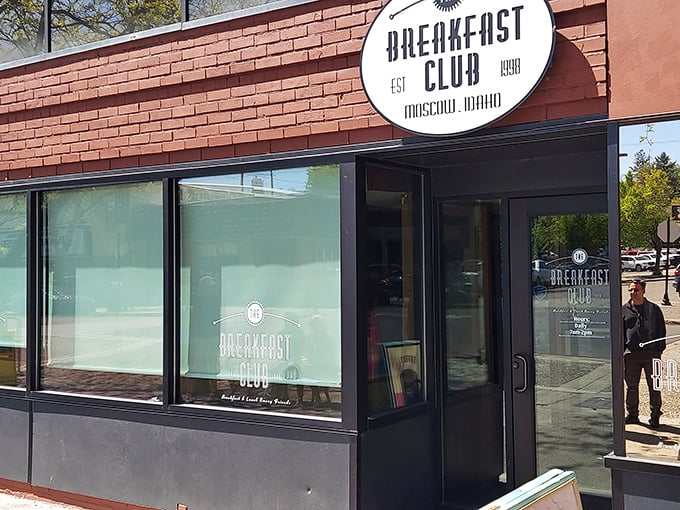 The brick facade of The Breakfast Club beckons like a morning lighthouse, promising salvation for the hungry souls of Moscow, Idaho.