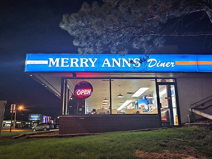 That classic "OPEN 24 HOURS" sign might as well read "Yes, we'll feed you pancakes at 3 AM and not judge your life choices."