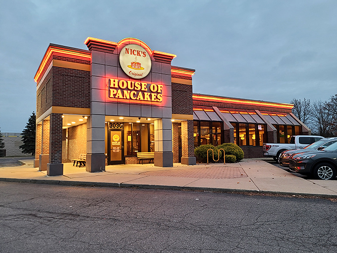 The beacon of breakfast bliss! Nick's Original House of Pancakes stands proudly against the Michigan sky, promising morning magic to all who enter.