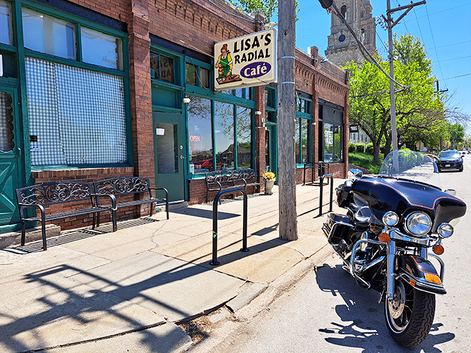The iconic storefront welcomes hungry patrons, with wrought-iron benches perfect for the inevitable weekend wait.