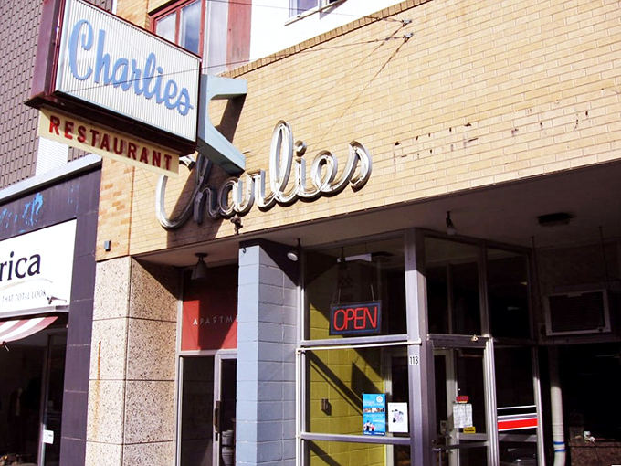 The iconic blue Charlie's sign has been beckoning hungry Minot residents for decades, a beacon of breakfast hope on Main Street.