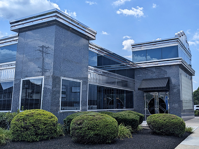 The sleek blue-gray exterior of Collegeville Diner stands like a beacon of breakfast hope on Route 29, promising culinary comfort within its gleaming walls.