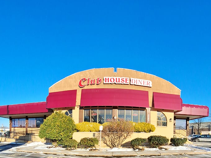 Winter sunshine bathes the Club House Diner's distinctive curved roofline and burgundy awnings&mdash;a beacon of comfort food hope on even the chilliest Pennsylvania days.
