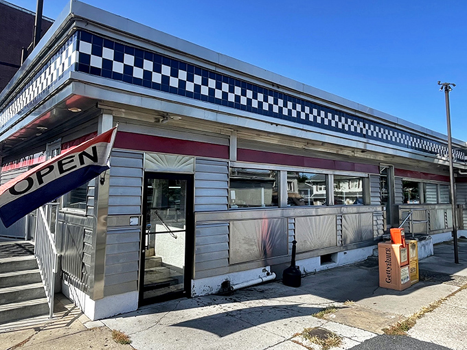 Morning sunshine highlights the iconic diner's exterior, where that "OPEN" flag might as well read "Salvation for the Hungry" to early risers and night owls.