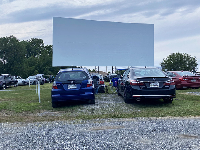 Sunset at Bengies transforms ordinary cars into time machines. The massive screen waits patiently as Maryland twilight paints the perfect backdrop for movie magic.