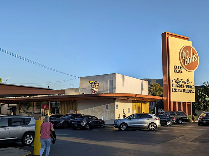 The iconic Bob's Big Boy sign stands tall against the California sky, a mid-century beacon calling hungry travelers to burger paradise.