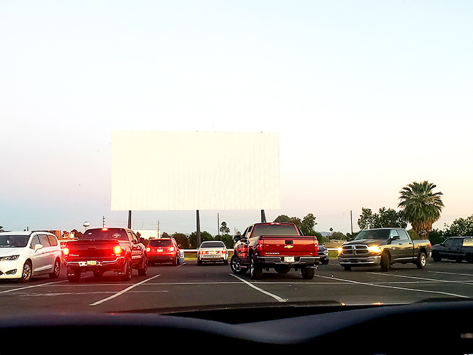 Desert twilight transforms ordinary parking into something magical – your personal box seat under infinite Arizona sky.