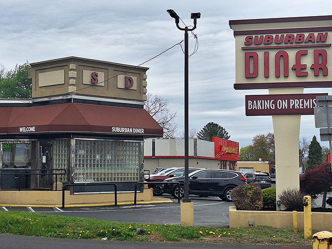 The iconic red signage of Suburban Diner stands as a beacon of breakfast hope along Feasterville-Trevose's busy thoroughfare. Baking on premises? You had me at hello.