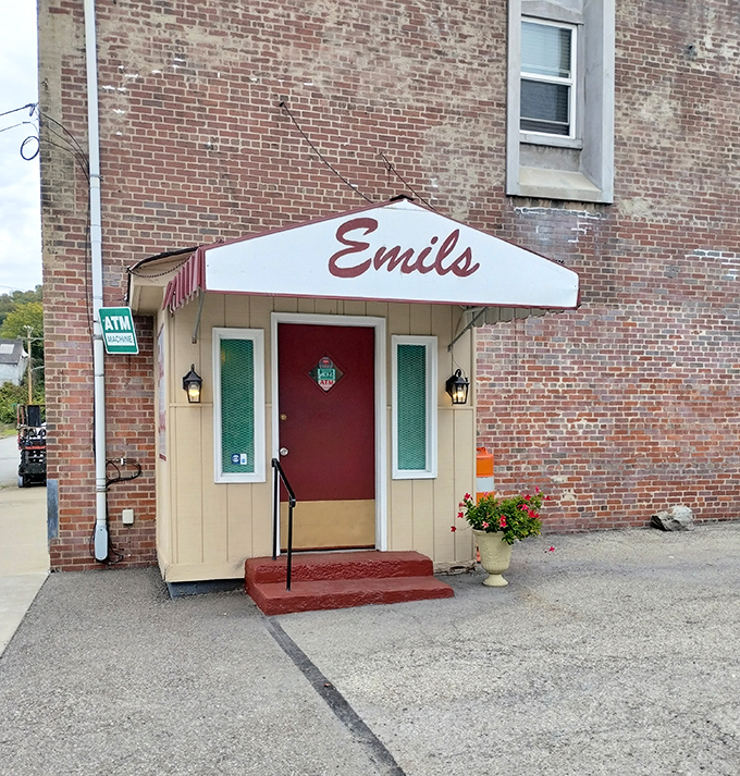 The unassuming brick exterior of Emil's Lounge stands like a sandwich sanctuary in Rankin, promising culinary treasures within its humble walls.