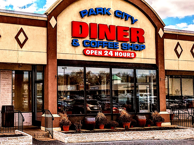 The neon-bright sign of Park City Diner stands like a lighthouse for hungry travelers, promising 24-hour comfort in Lancaster's sea of dining options.