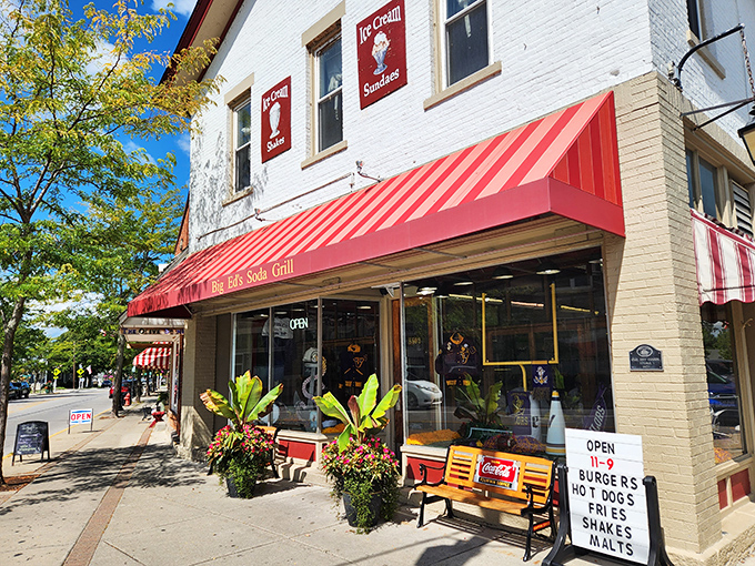 The iconic red-and-white awning of Big Ed's beckons like a time machine to simpler days when conversation trumped cell phones.