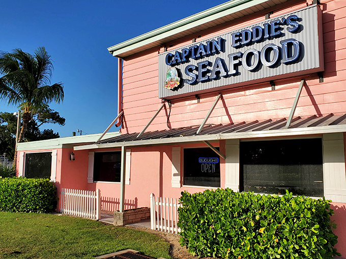 That coral-pink exterior isn't being subtle &ndash; it's practically shouting "We've got amazing seafood!" across the quiet streets of Nokomis. Florida charm personified.