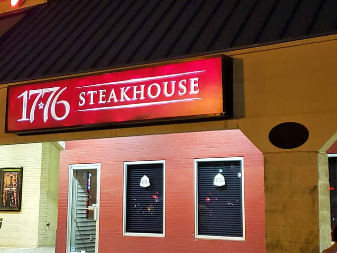 The iconic red sign glows like a beacon for beef lovers. 1776 Steakhouse stands proud in Rehoboth Beach, a revolutionary dining experience waiting to happen.