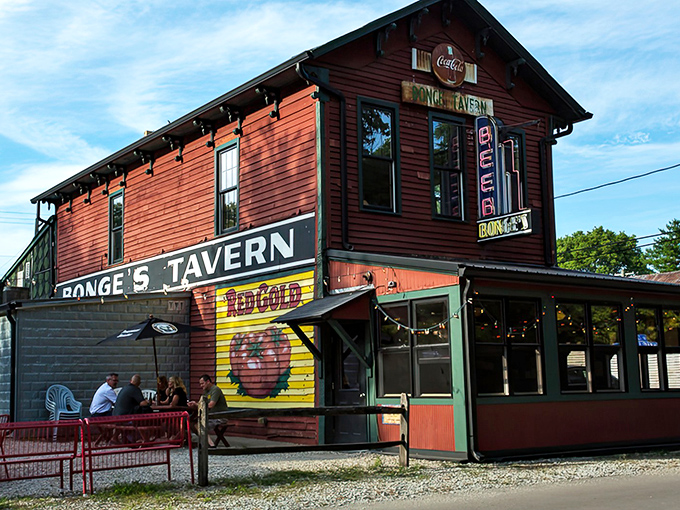 The burgundy-colored beacon of Bonge's Tavern stands proudly against an Indiana sky, promising culinary treasures that justify every mile of the journey. 