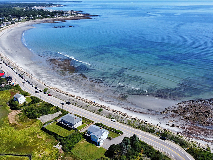 The curved shoreline of Rye Beach stretches like nature's perfect smile, where the Atlantic meets New Hampshire's precious slice of coastal paradise.