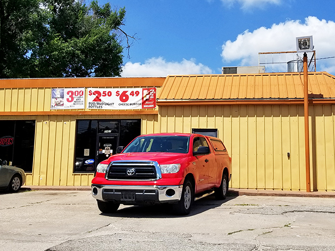Kansas sunshine bounces off this mustard-yellow building, a beacon for burger aficionados who know that flash rarely equals flavor.