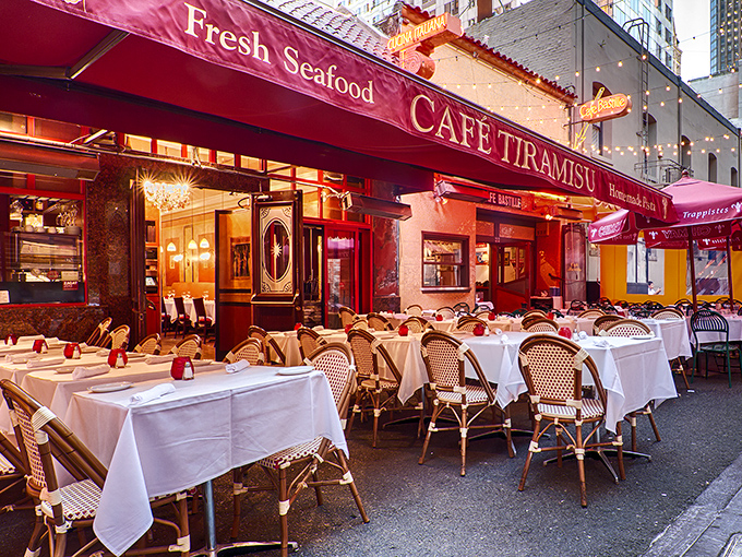 Caf&eacute; Tiramisu's burgundy awning and European-style sidewalk seating transform this San Francisco alley into a little slice of Italy. La dolce vita awaits!