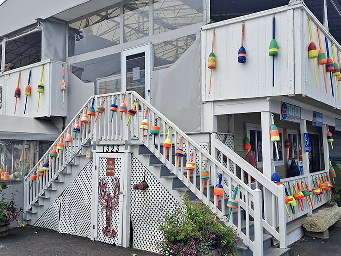 Those rainbow-colored buoys aren't just decoration—they're a siren call to seafood lovers everywhere. Petey's exterior promises nautical charm and fresh catches.
