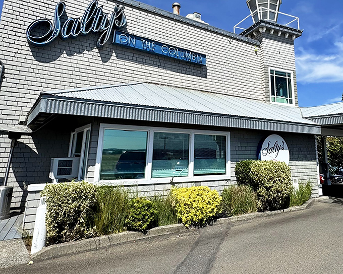 The iconic white-bricked exterior of Salty's welcomes you like an old friend, complete with a lighthouse-inspired tower that practically winks at passing boats.