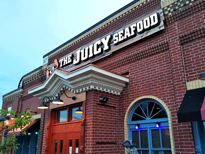 The brick facade of The Juicy Seafood stands like a lighthouse for landlocked seafood lovers, promising maritime treasures in the shadow of the Rockies.
